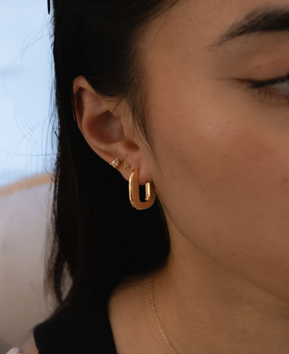 Jacquelyne Two-Tone Interlock Drop Hoop Earrings | Sachelle Collective